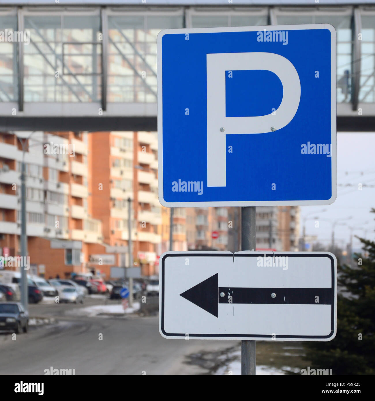 Parking left. Traffic sign with the letter P and the arrows to the left ...