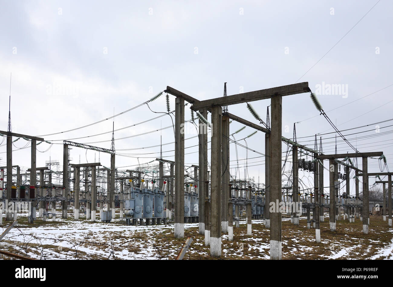 Power plant is a station of transformation. A lot of cables, poles and ...