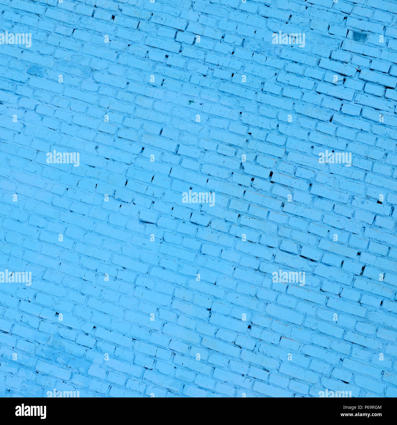 Square brick block wall background and texture. Painted in blue Stock ...