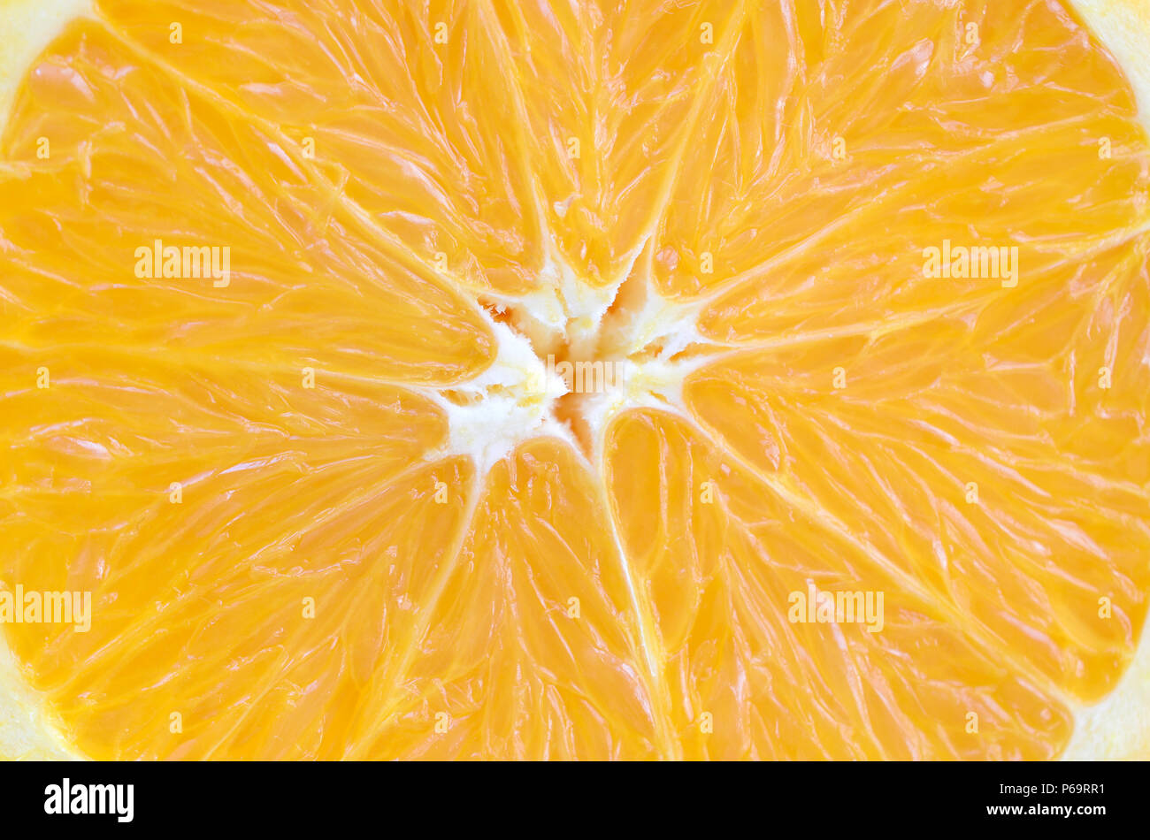 Top view of a fragment of the orange fruit slice close up. Macro background texture Stock Photo ...