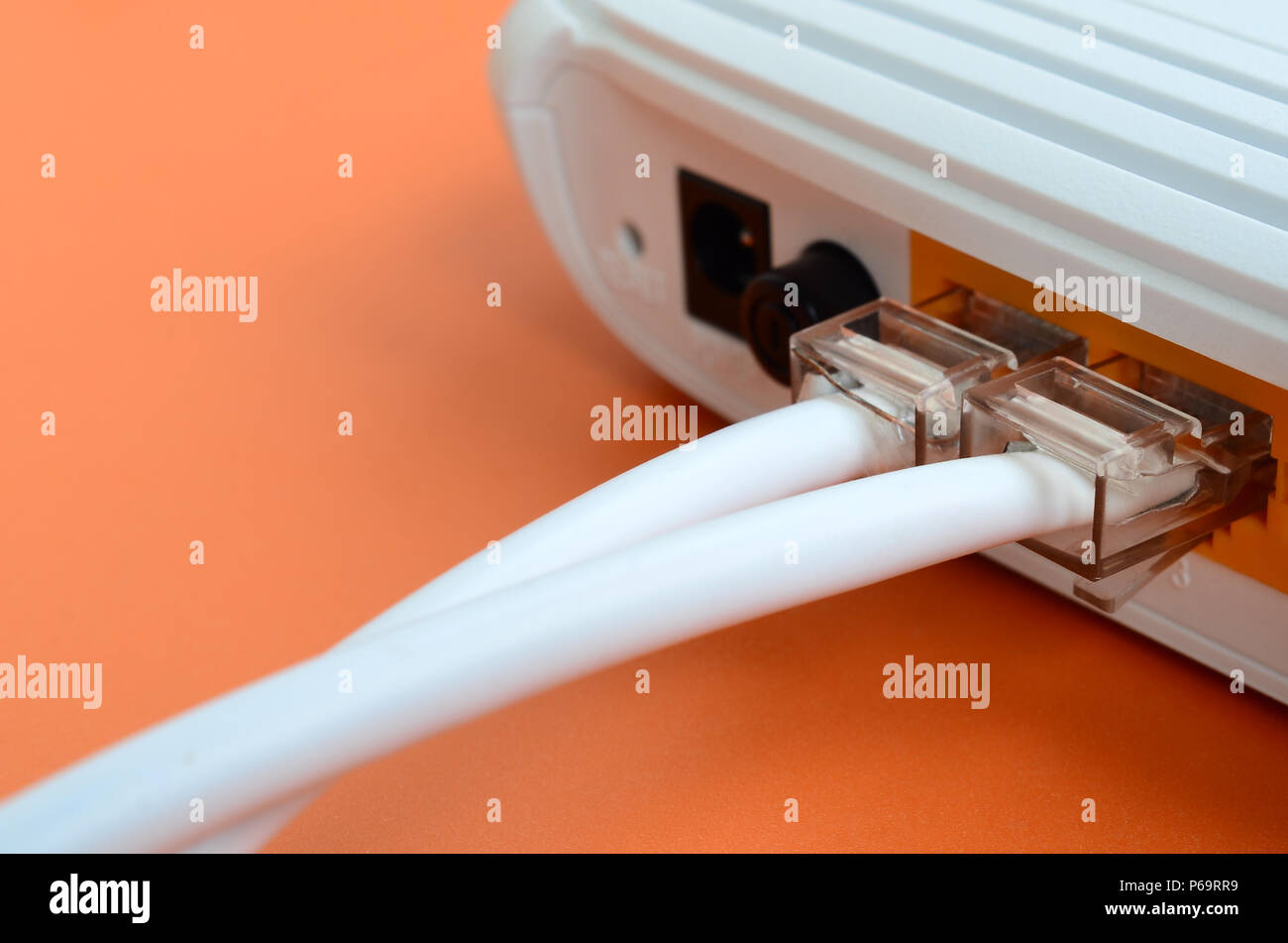 The Internet cable plugs are connected to the Internet router, which ...