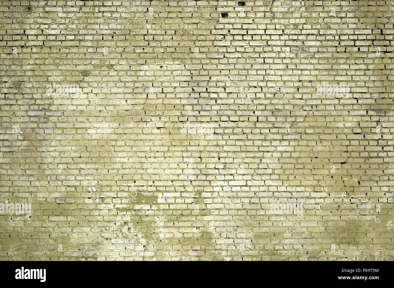 Square brick block wall background and texture. Painted in yellow Stock ...