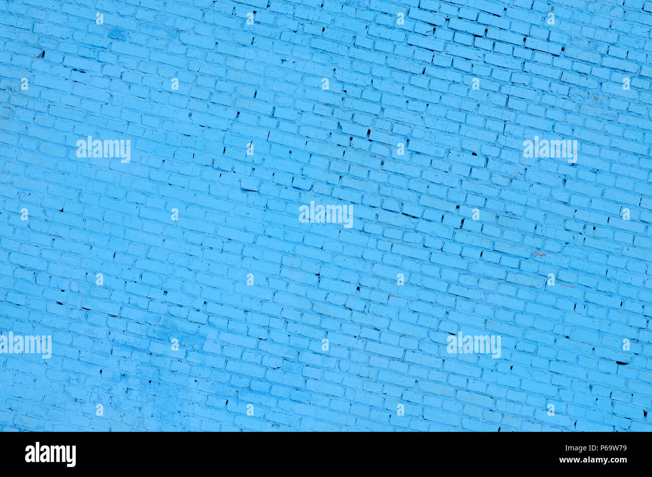 Square brick block wall background and texture. Painted in blue Stock ...
