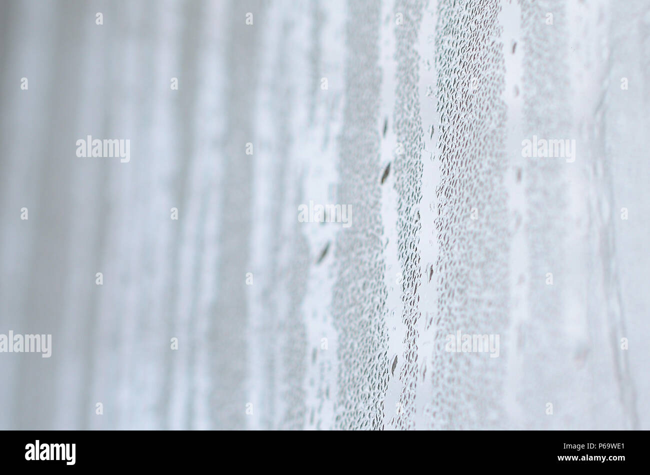 The texture of a misted glass with a lot of drops and condensation ...