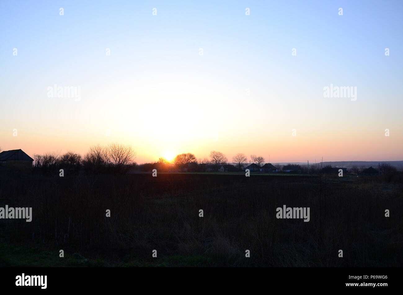 Dawn in the village. Sunrise in the suburban landscape Stock Photo - Alamy