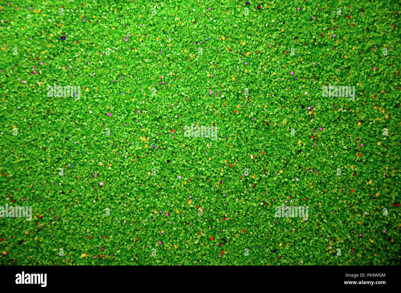 Texture of a colored granular sand close up. Green grains Stock Photo ...