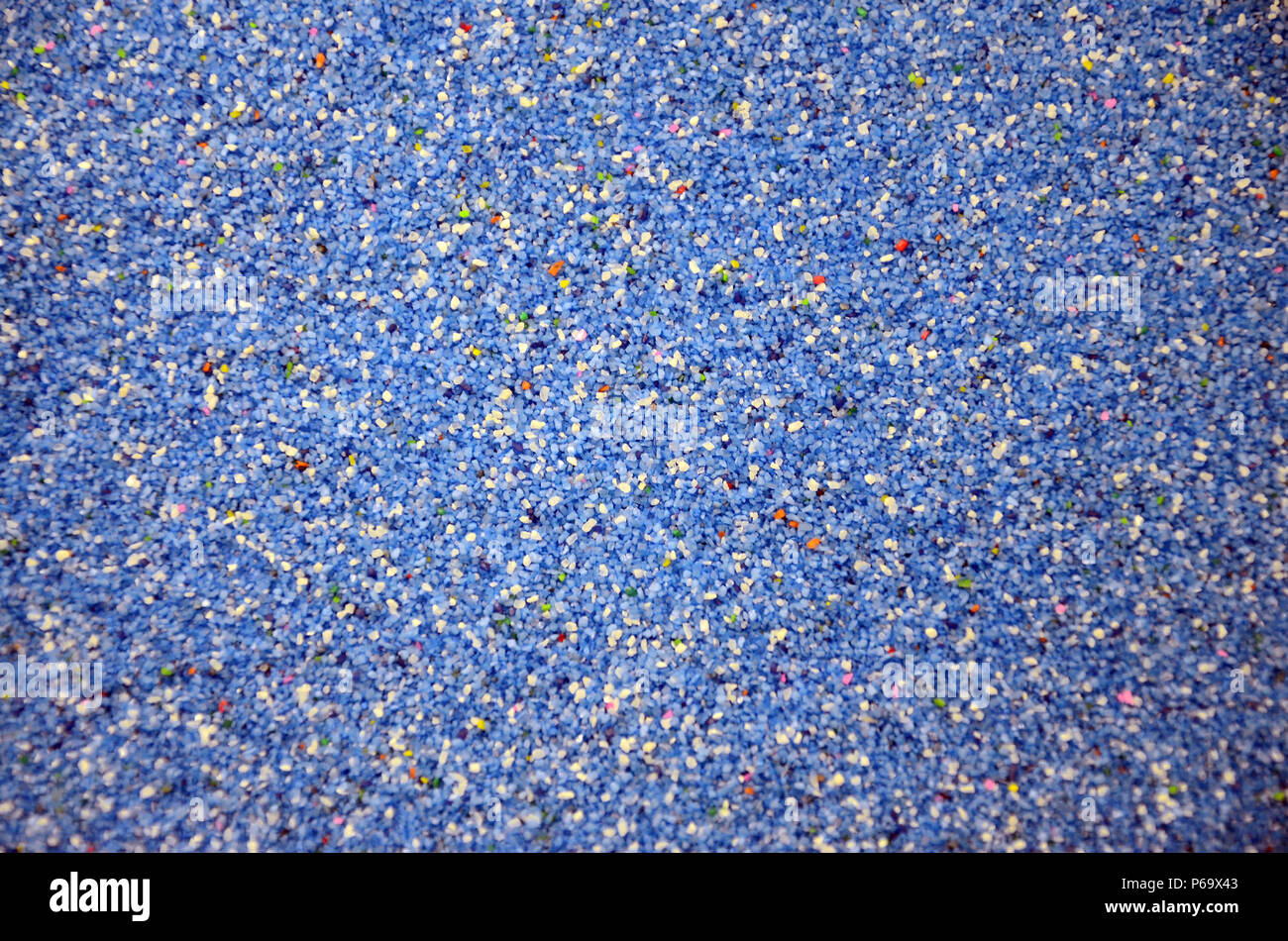 Texture of a colored granular sand close up. Blue grains Stock Photo ...