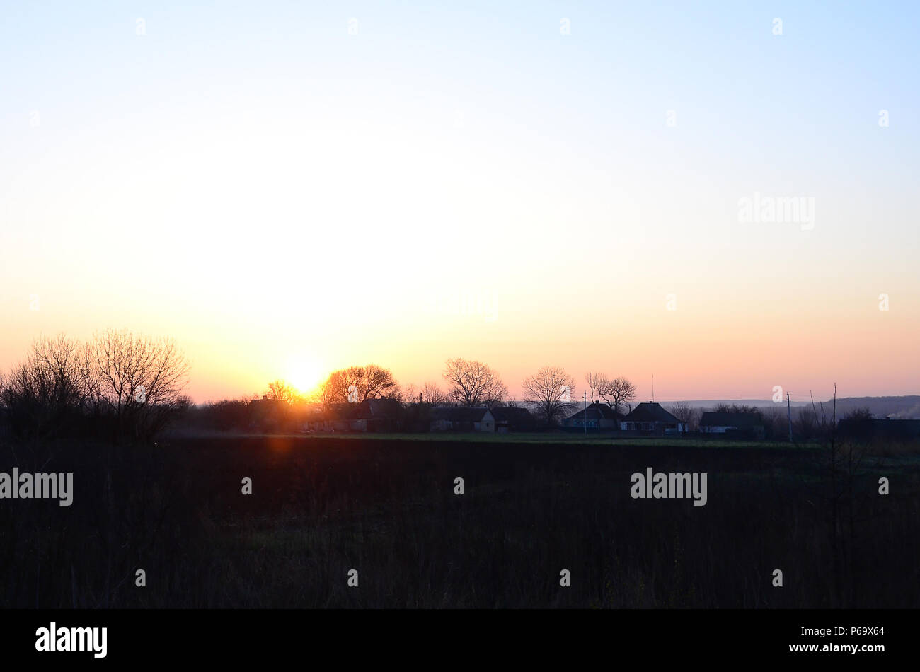 Dawn in the village. Sunrise in the suburban landscape Stock Photo - Alamy