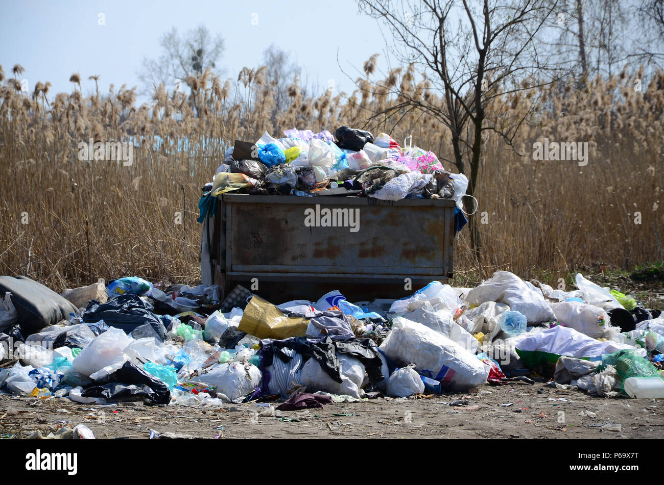 The garbage can is packed with garbage and waste. Untimely removal of ...