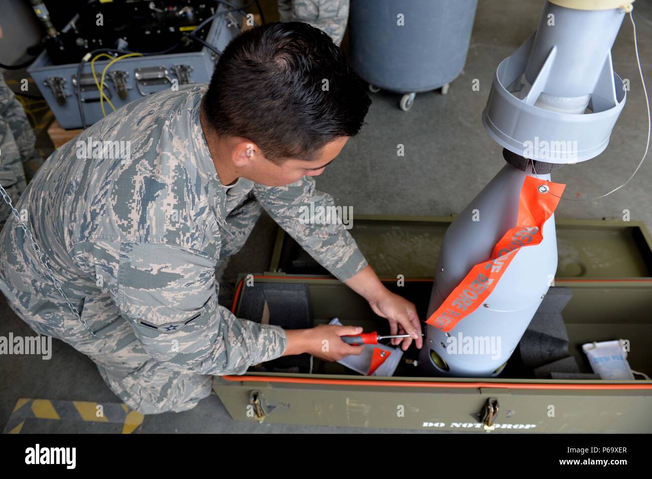 Airman Andrew, 432nd Maintenance Squadron munitions flight crew member ...