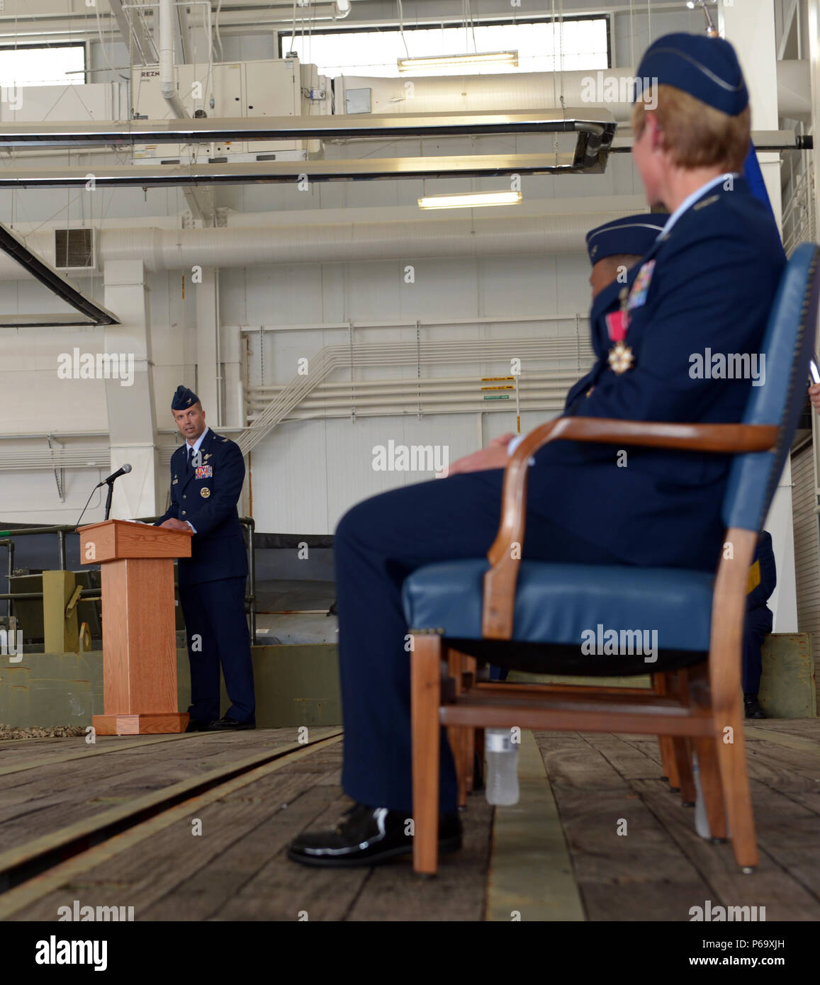 Col. Ty Neuman, 2nd Bomb Wing commander, recognizes Col. Kristin ...