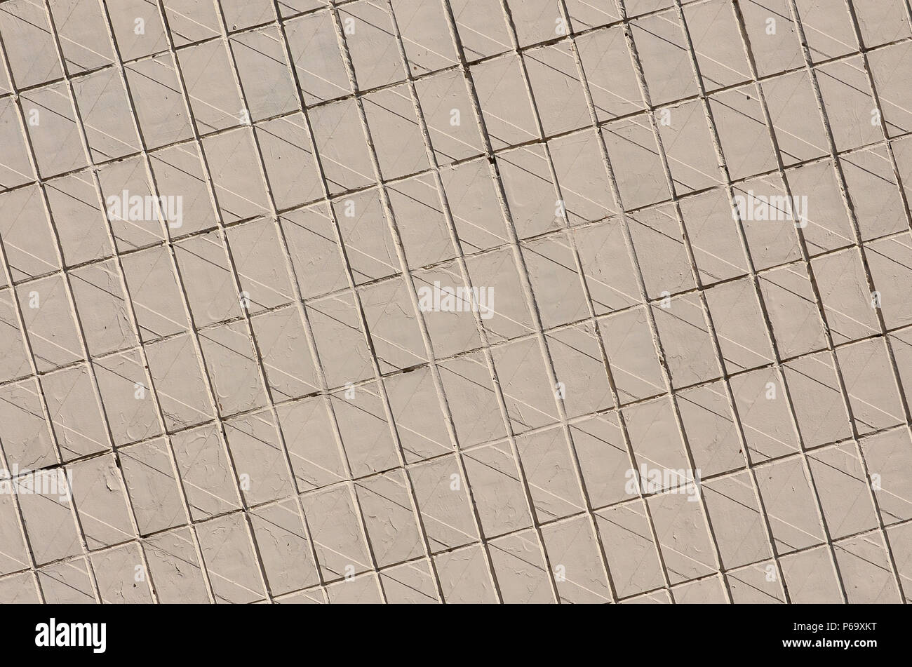 Old Soviet beige wall tiles. The texture of the classical outer tile ...