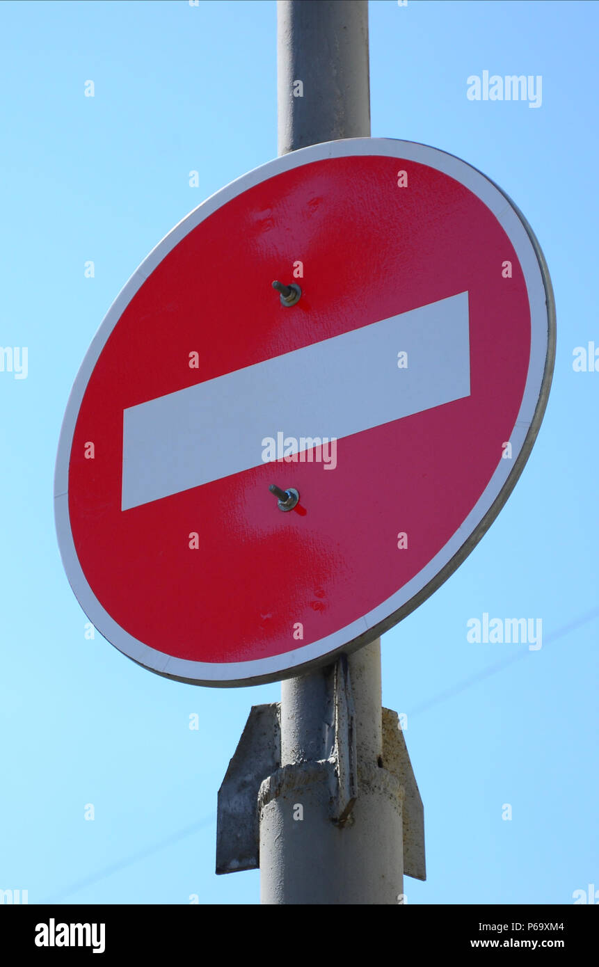 Road sign in the form of a white rectangle in a red circle. No entry ...