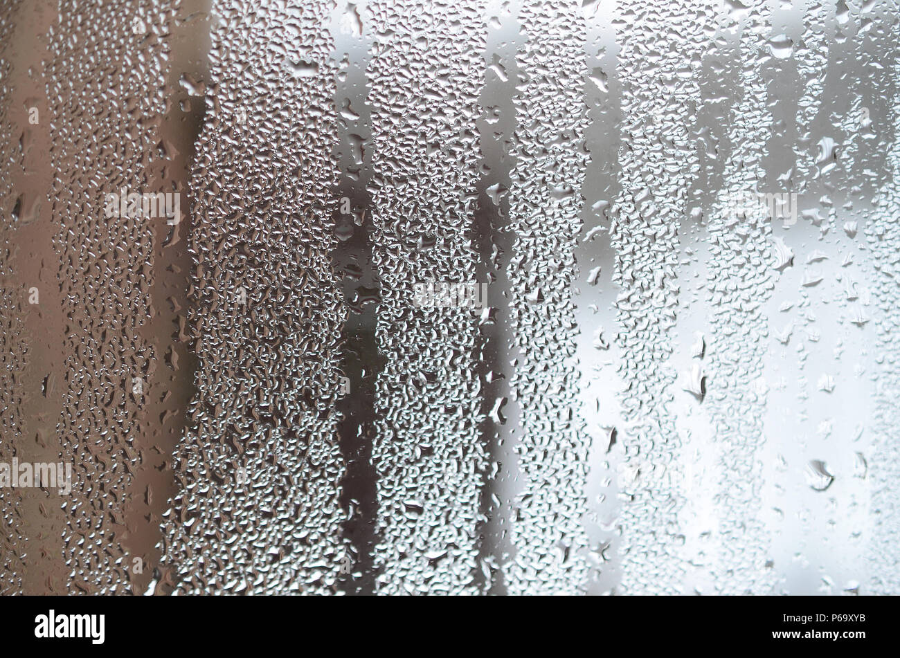 The texture of a misted glass with a lot of drops and condensation ...