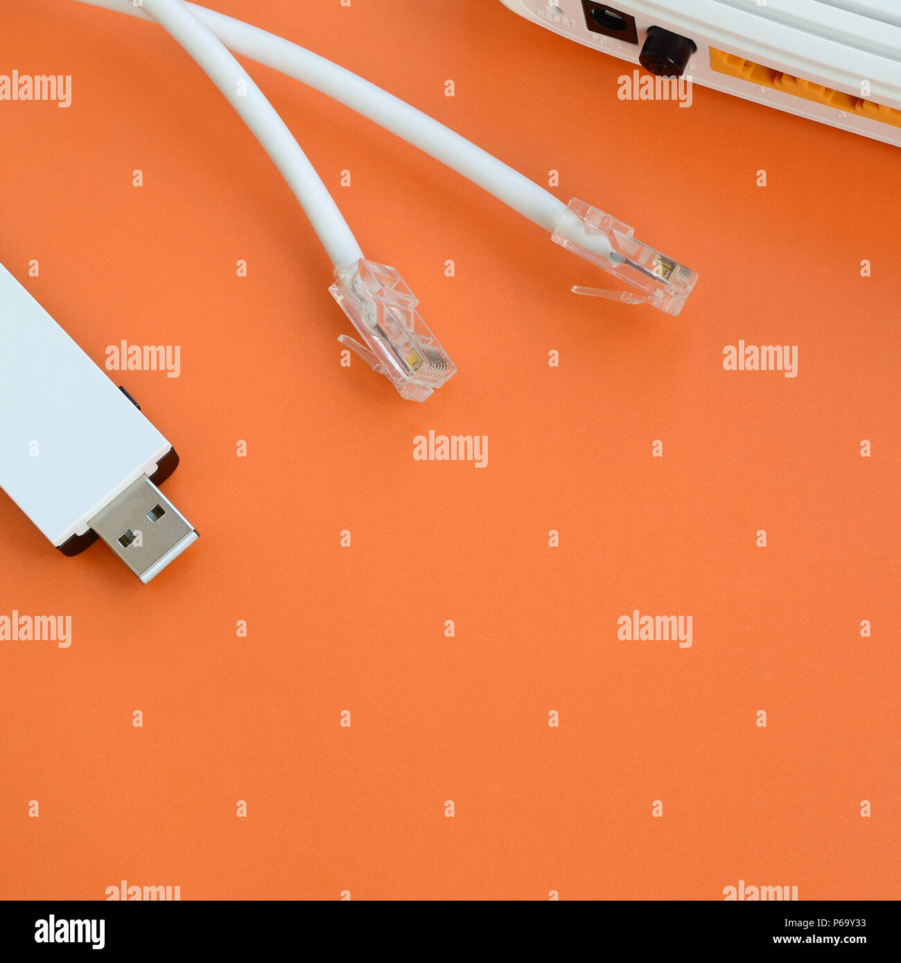 Internet router, portable USB wi-fi adapter and internet cable plugs ...