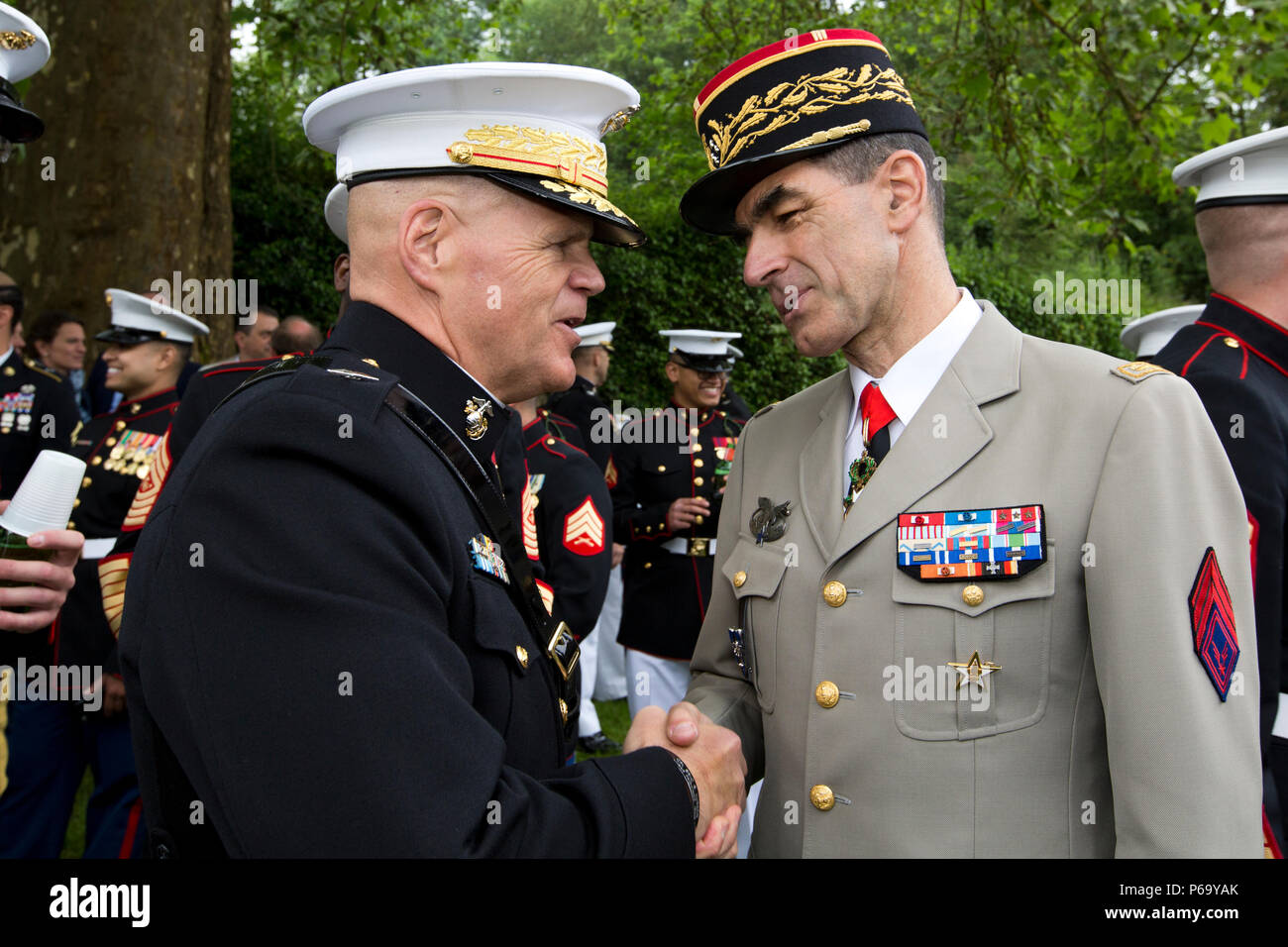 Commandant of the Marine Corps, Gen. Robert B. Neller, left, speaks ...