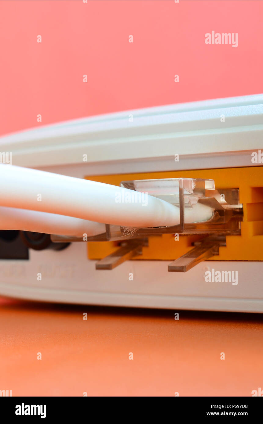 The Internet cable plugs are connected to the Internet router, which ...