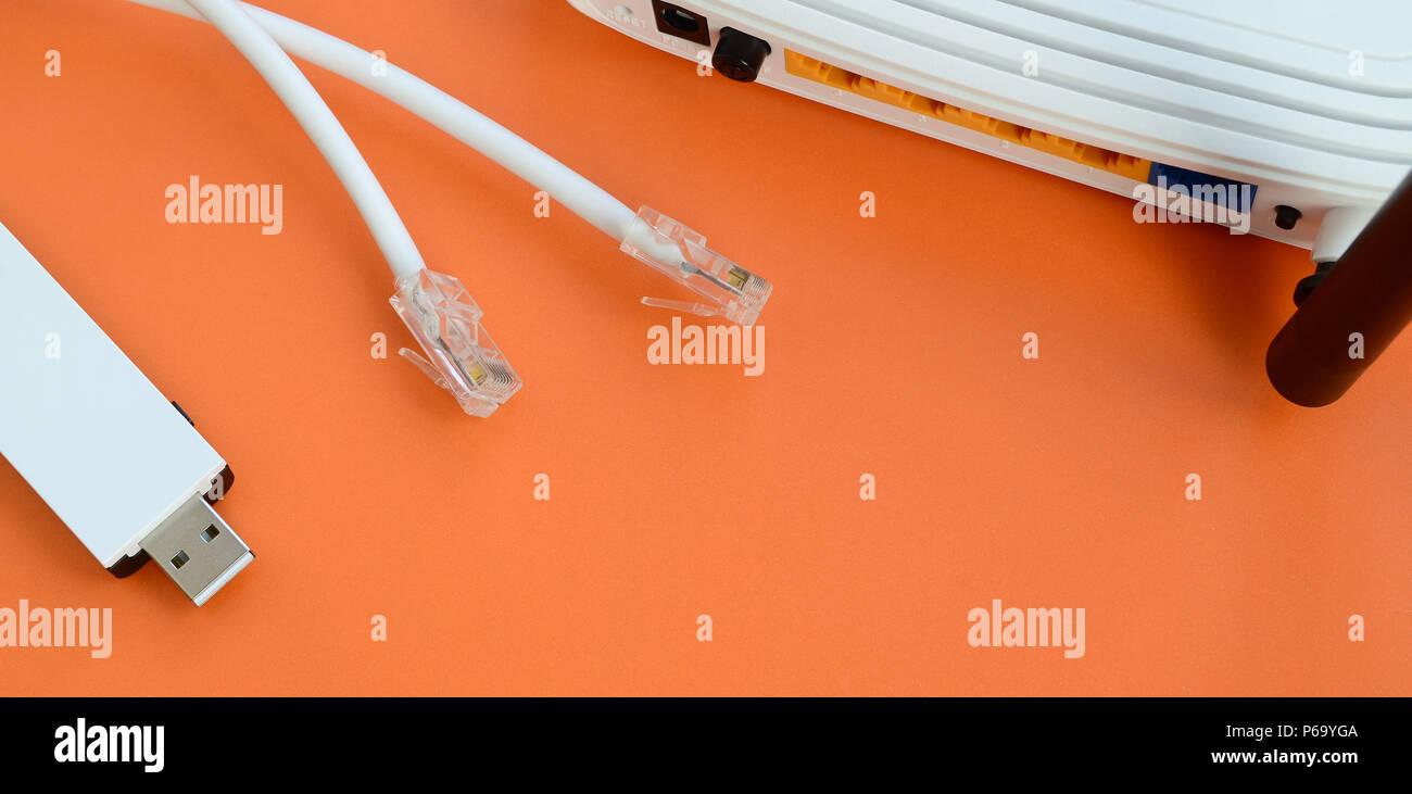 Internet router, portable USB wi-fi adapter and internet cable plugs ...