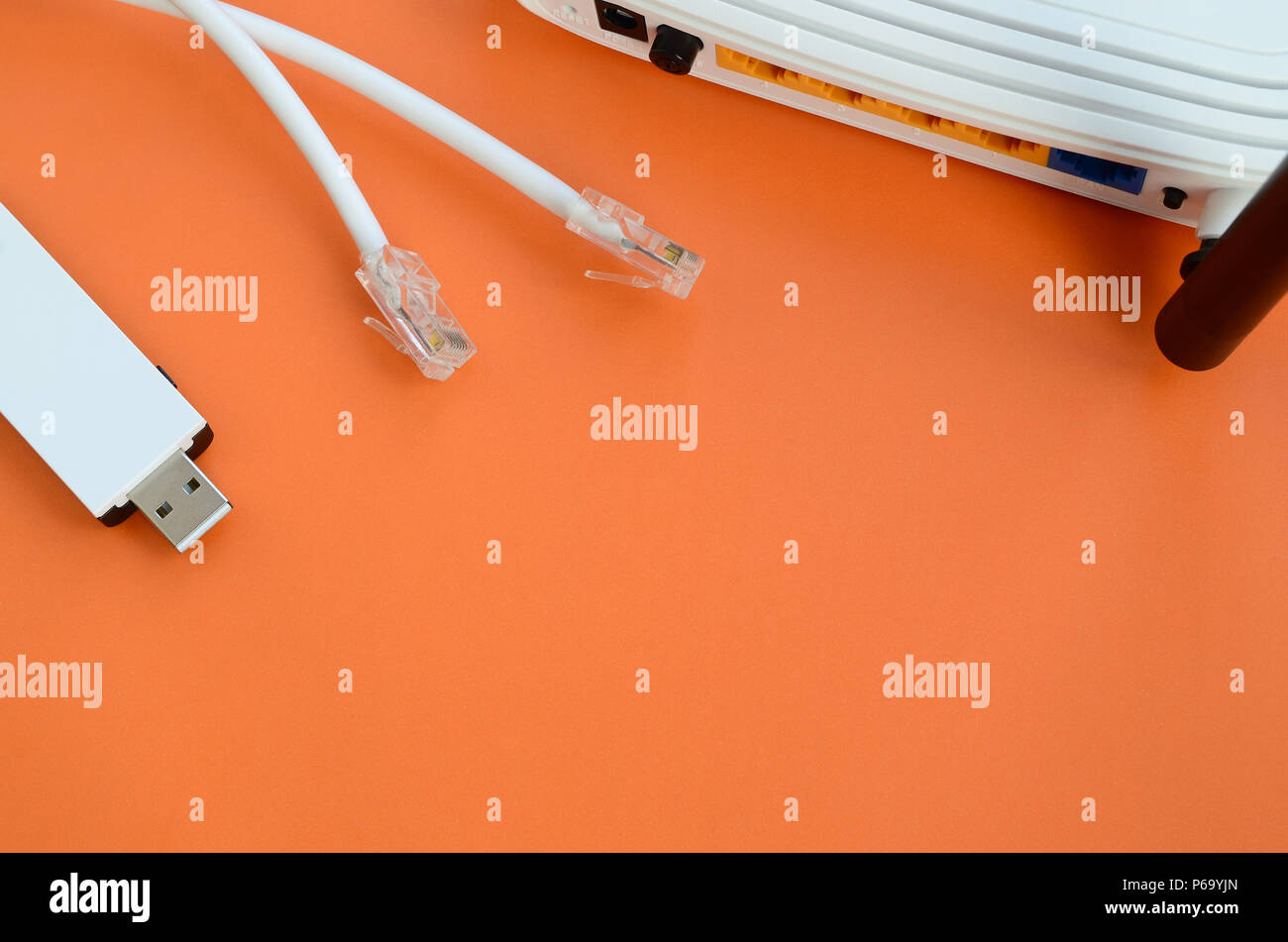 Internet router, portable USB wi-fi adapter and internet cable plugs ...