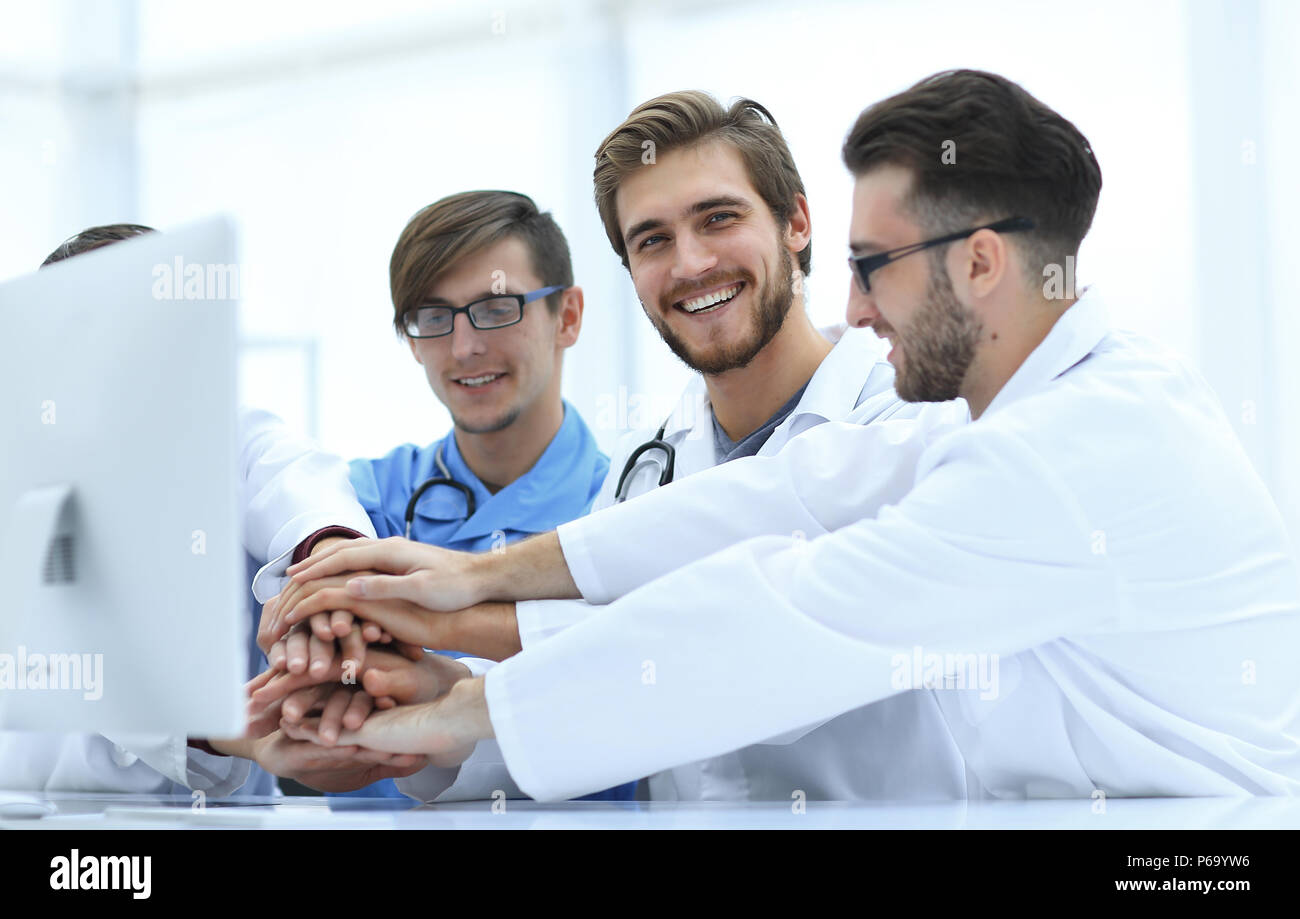 medical team showing their unity Stock Photo - Alamy