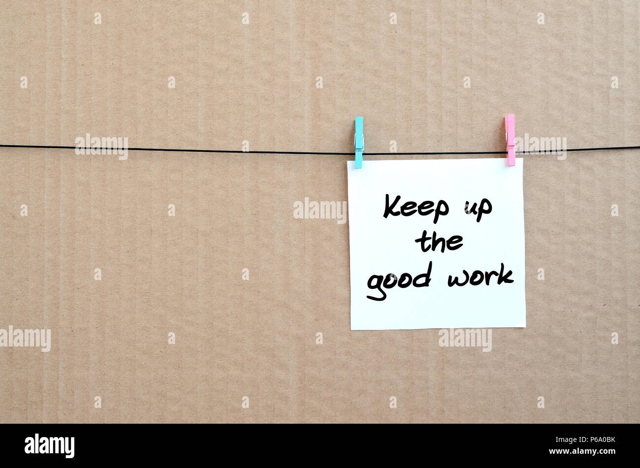 Keep up the good work. Note is written on a white sticker that hangs ...