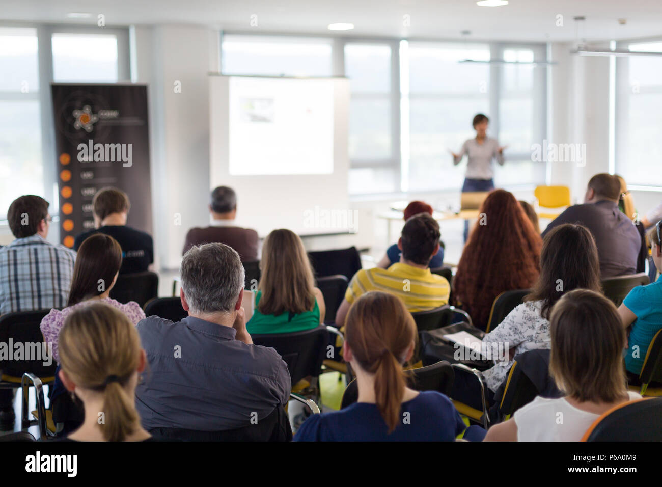 Speaker giving presentation on business conference Stock Photo - Alamy