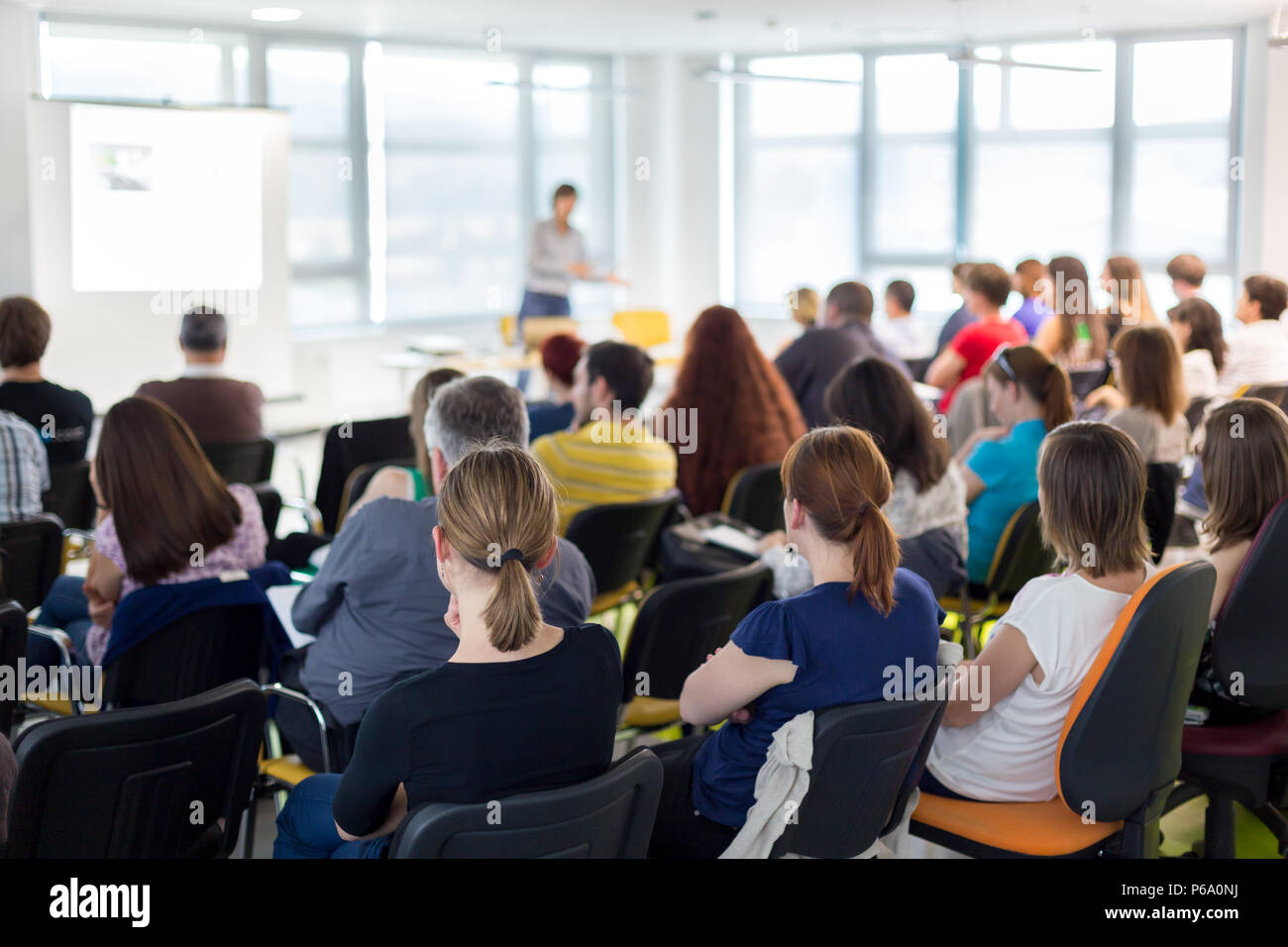 Speaker giving presentation on business conference Stock Photo - Alamy