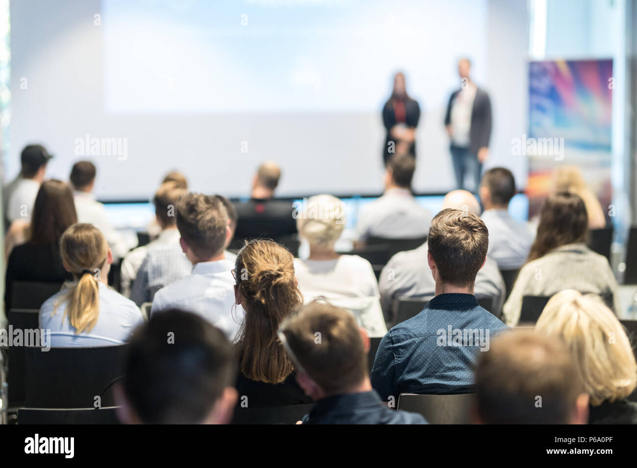 Business speakers giving a talk at business conference event Stock ...