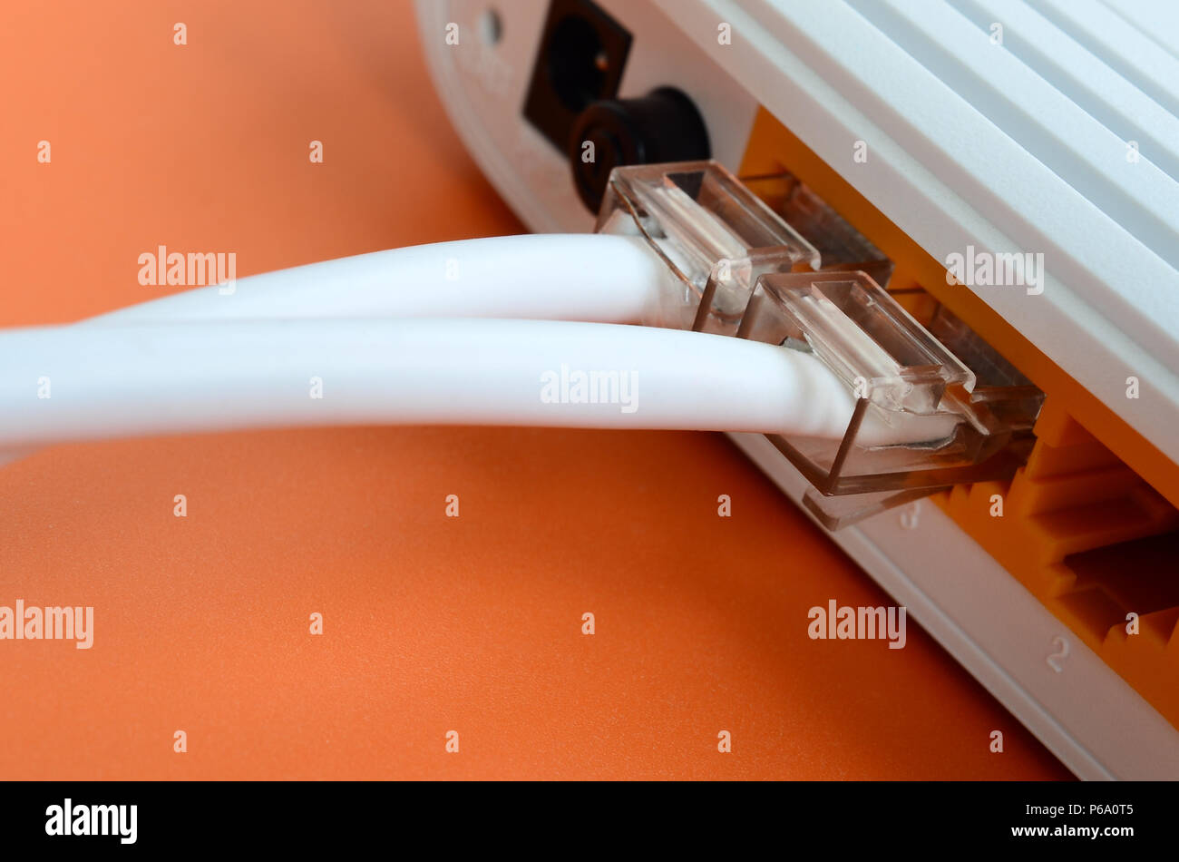 The Internet cable plugs are connected to the Internet router, which ...