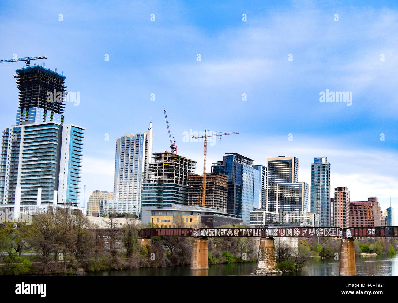 Construction cranes dominate the ever-growing skyline of Austin, TX ...