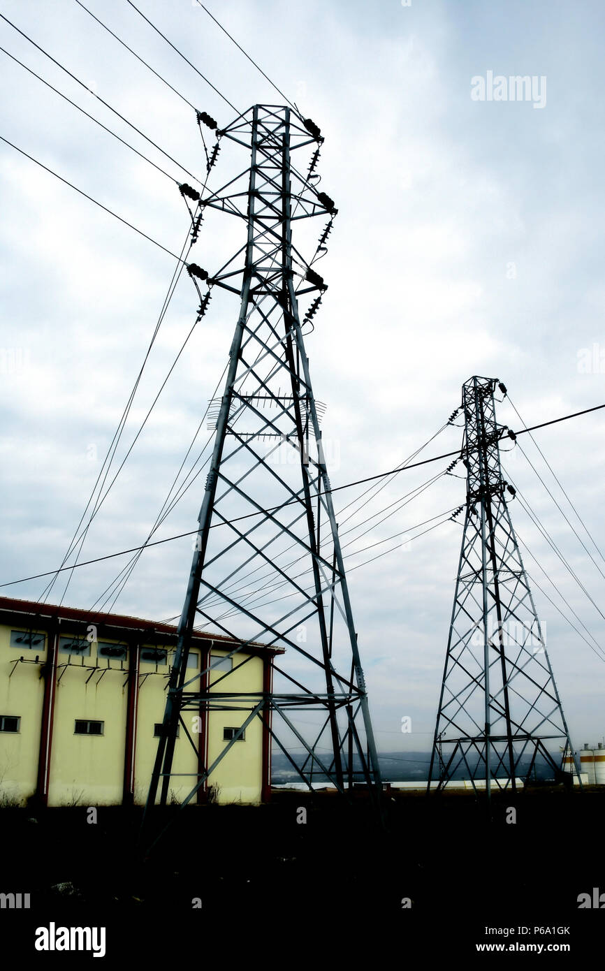 an image of a metal tower of Power Lines Stock Photo - Alamy