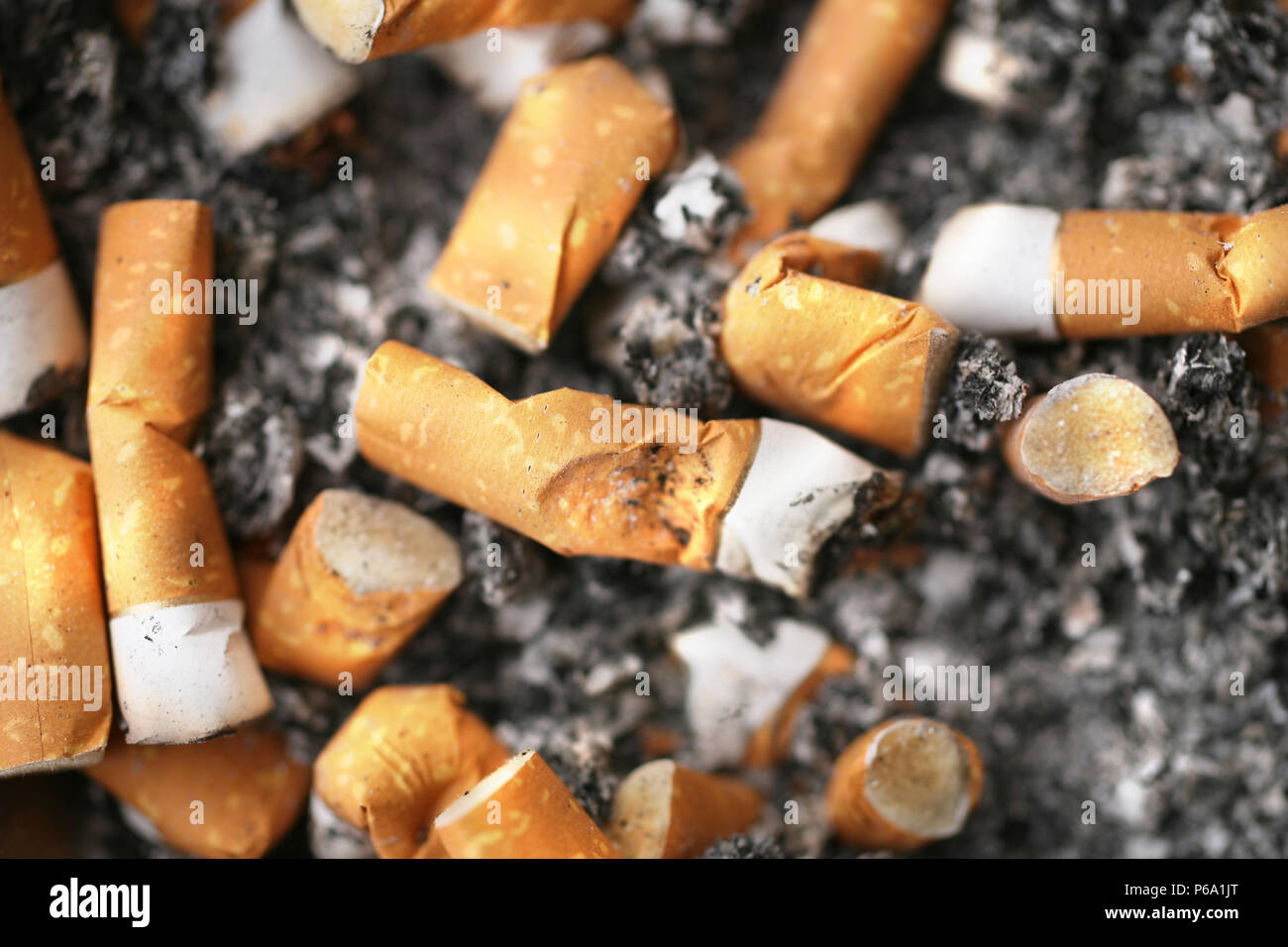 an image of cigarette buts Stock Photo - Alamy
