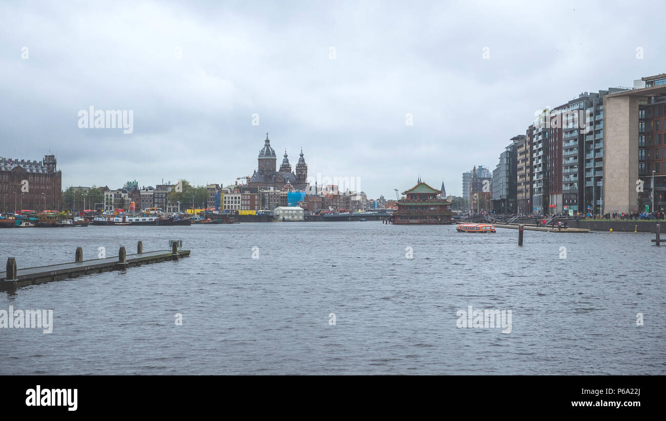 Dutch landscape with water canals in Amsterdam, the Netherlands Stock ...