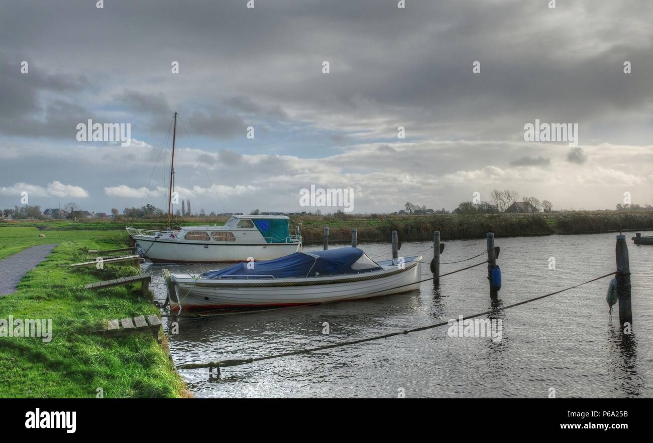 Dutch landscape with water canals in Amsterdam, the Netherlands Stock ...