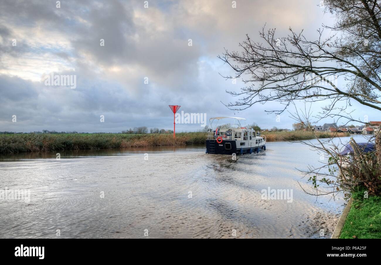 Dutch landscape with water canals in Amsterdam, the Netherlands Stock ...