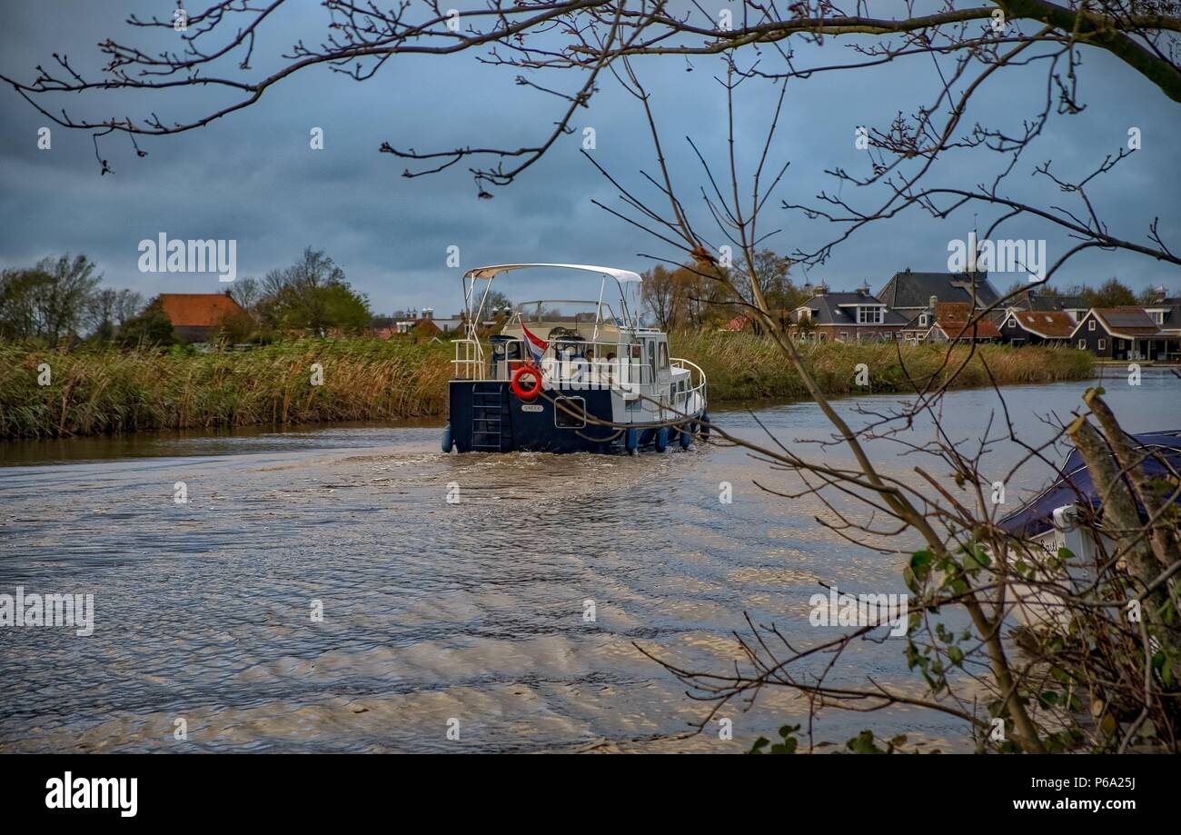 Dutch landscape with water canals in Amsterdam, the Netherlands Stock ...