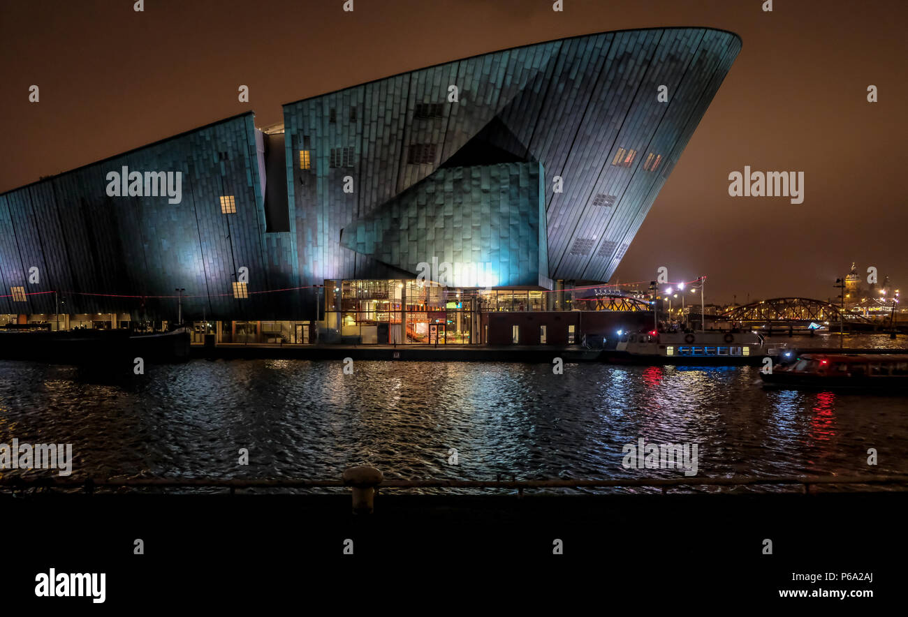 Boat shaped building in Amsterdam harbor in the Netherlands Stock Photo ...