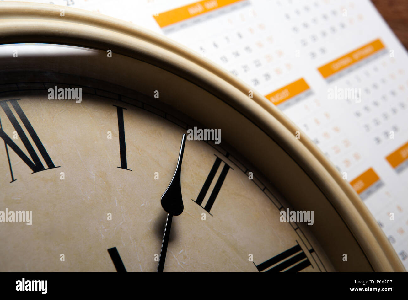 sheet of a calendar with the number of days and clock close-up Stock ...