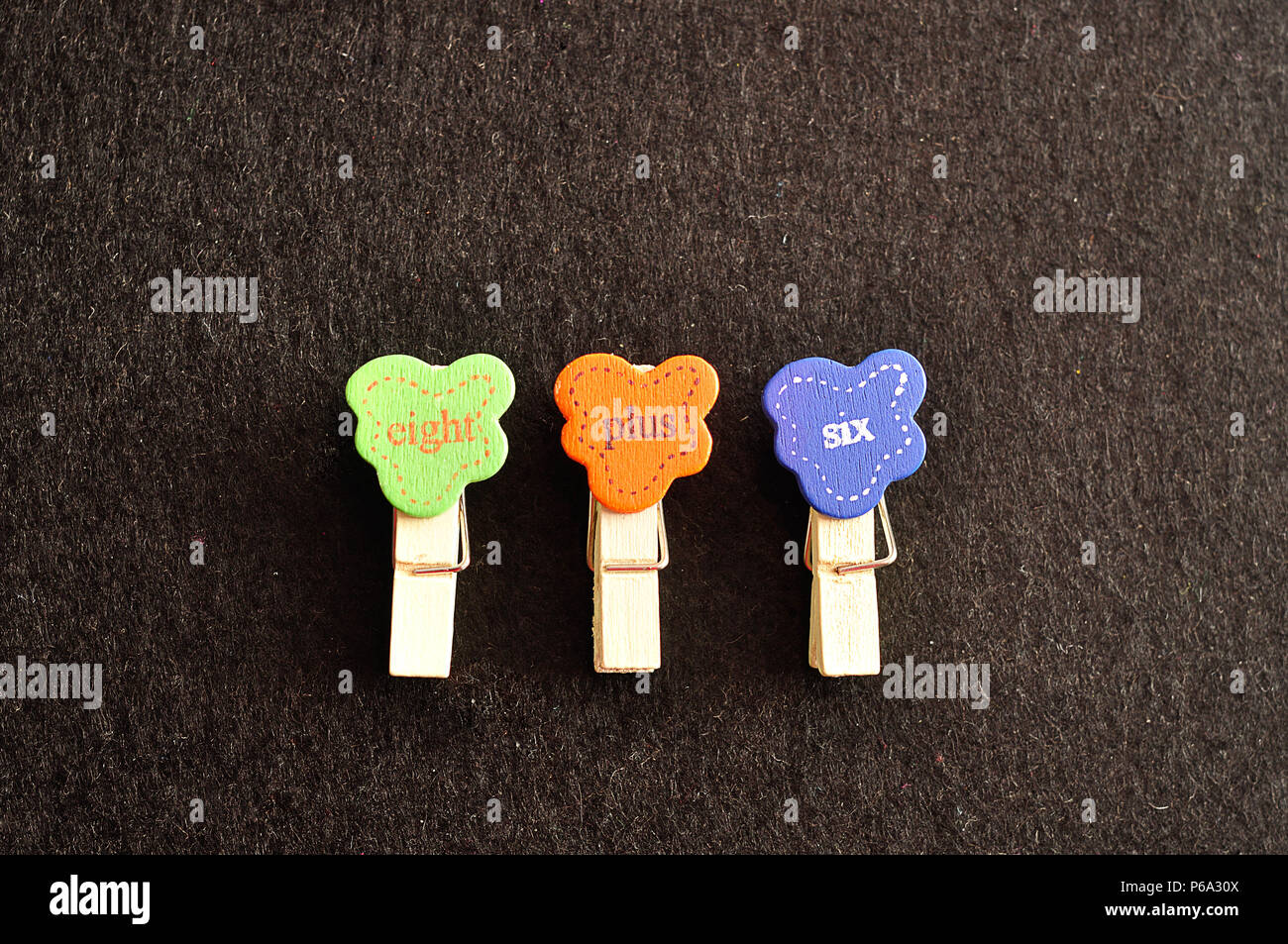 Eight plus six on a black background Stock Photo - Alamy