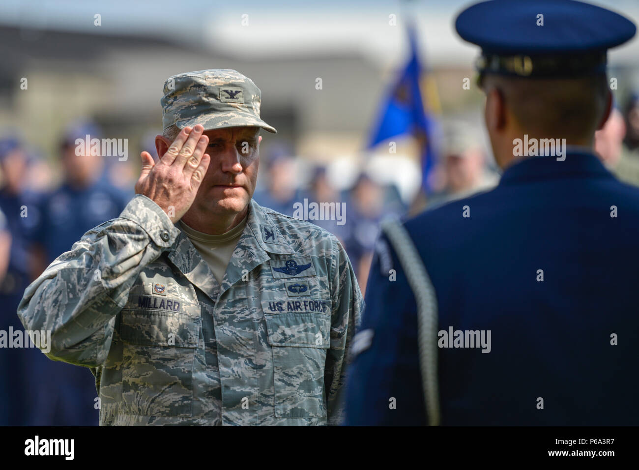 Col. J.C. Millard, 89th Airlift Wing commander, salutes an 11th Wing ...