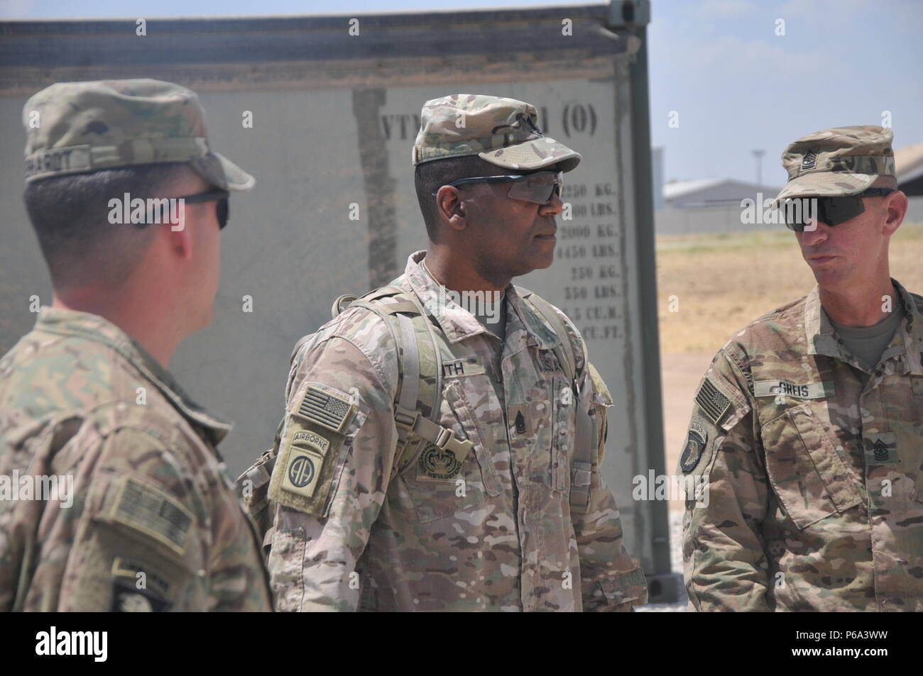 Command Sgt. Maj. Alonso Smith, center, command sergeant major of ...
