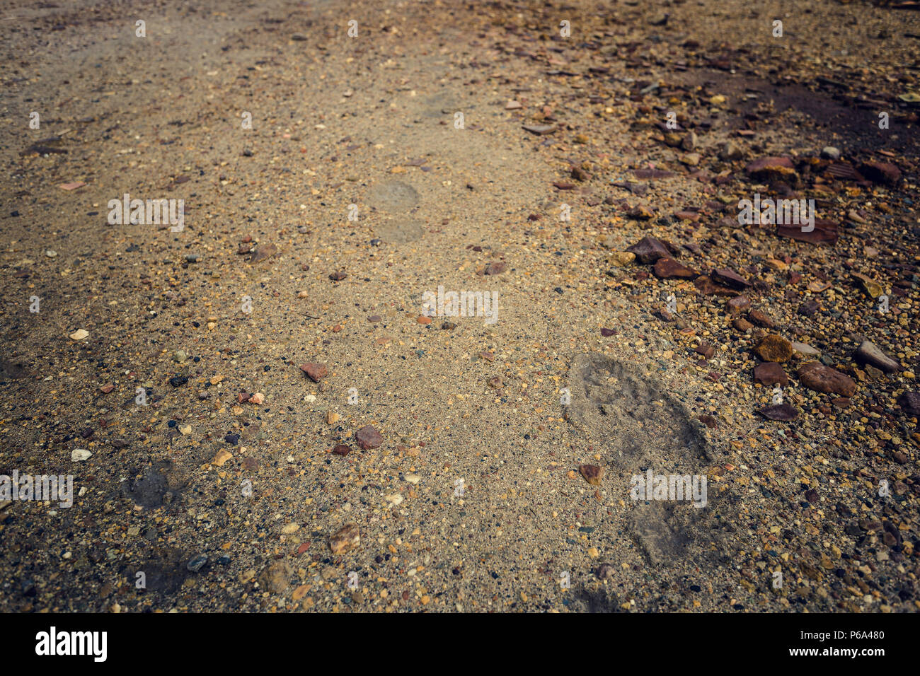 Footprint on the earth and stones in the mining landscape in the ...