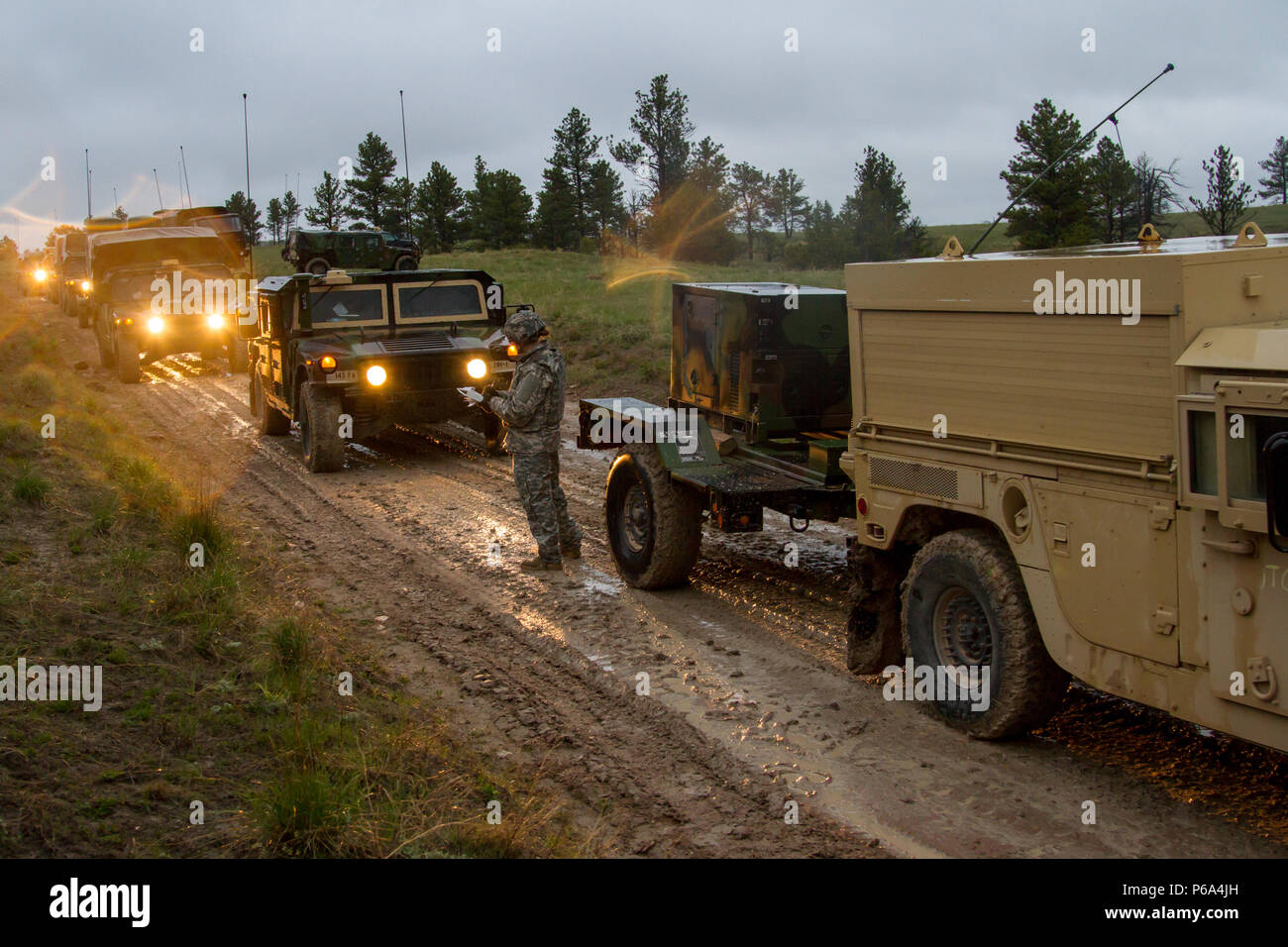 Vehicles from 1st Battalion, 145th Field Artillery Regiment, 65th FA ...