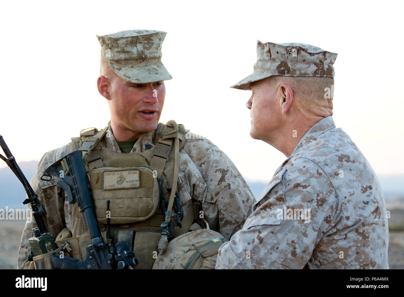 U.S. Marine Corps 1st Lt. Mark K. Morton, left, the first sergeant of ...