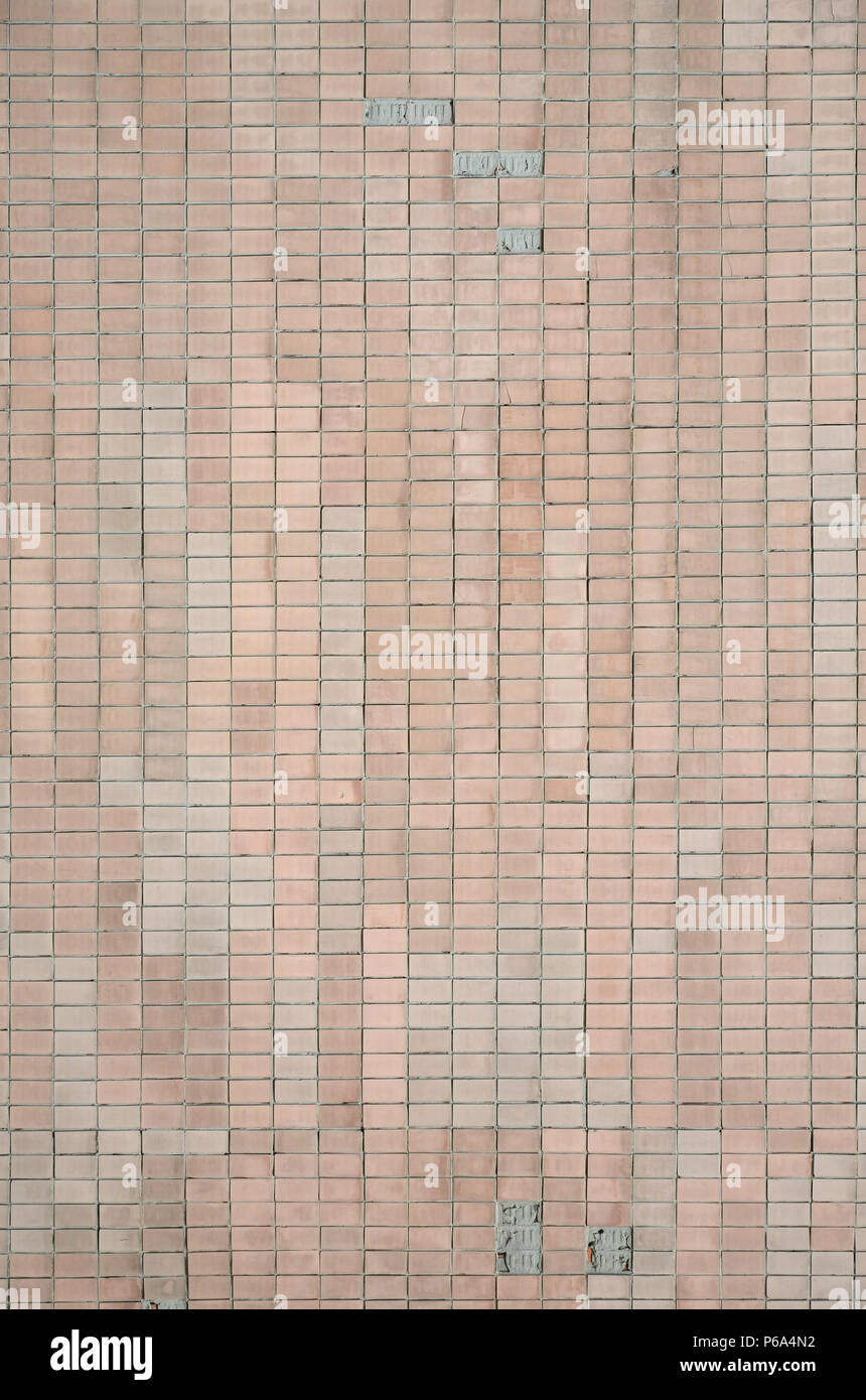 Old Soviet beige wall tiles. The texture of the classical outer tile ...