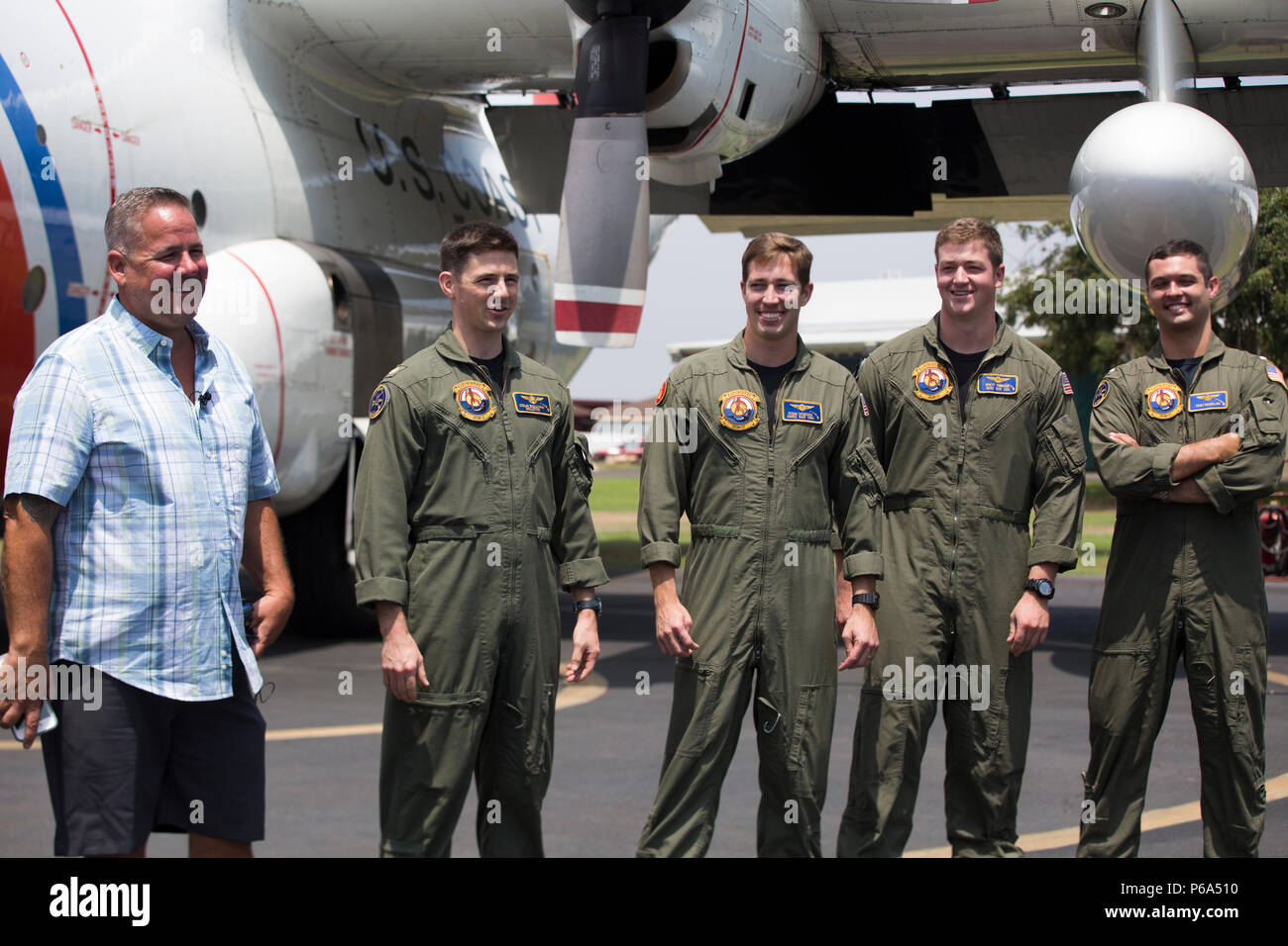 COAST GUARD AIR STATION BARBERS POINT - Navy Lt. Colin Sullivan (second ...