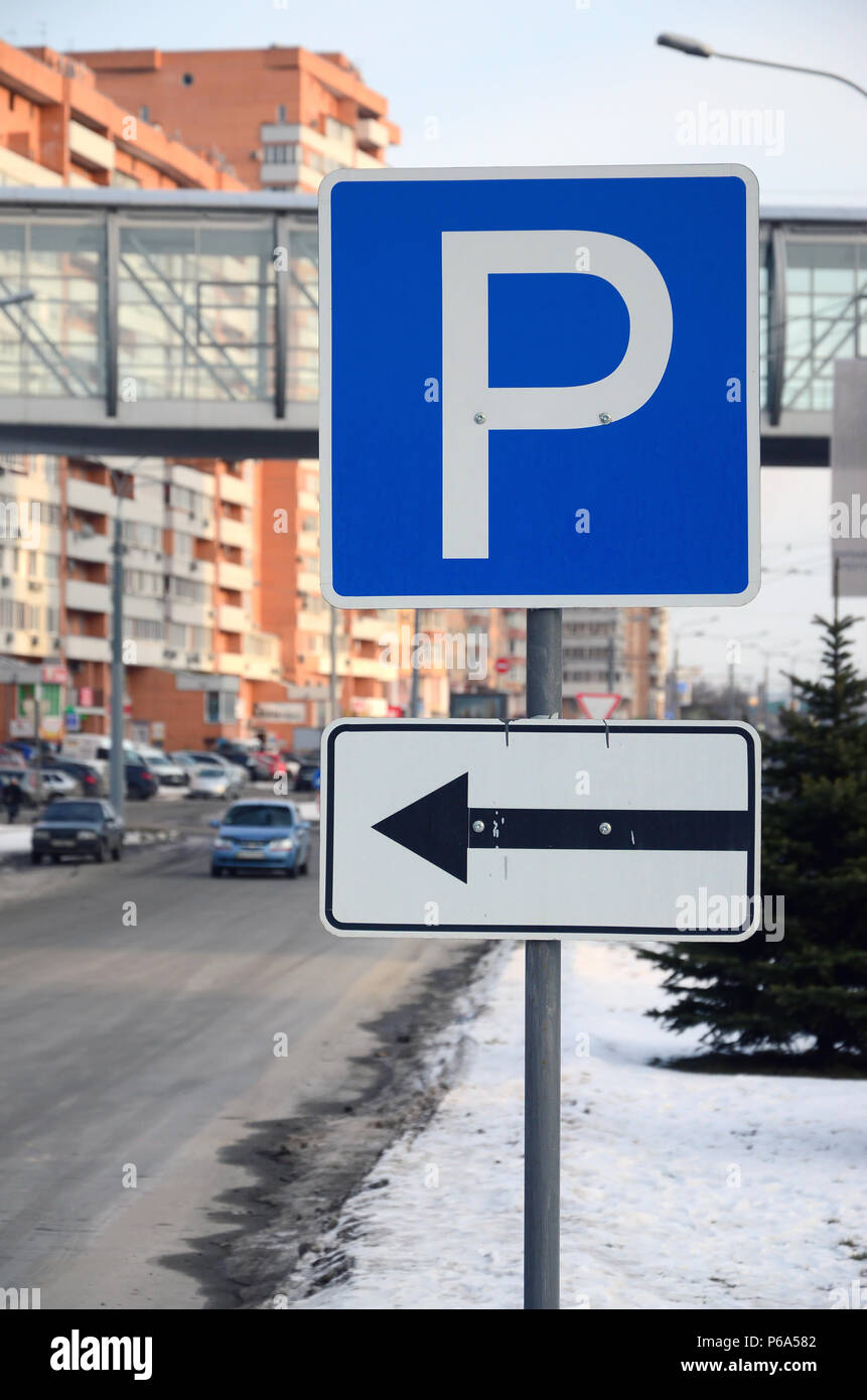 Parking left. Traffic sign with the letter P and the arrows to the left ...