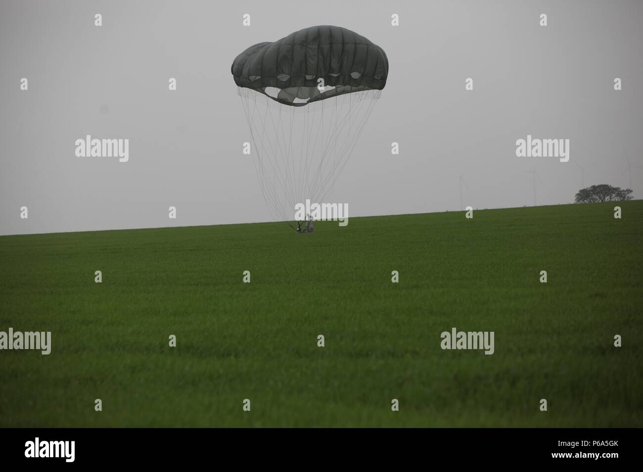 U.S. and German paratroopers conduct airborne operations from a C-130J ...
