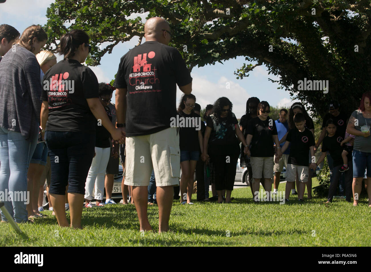 Members of Neighborhood Church, a mixed community of service members ...