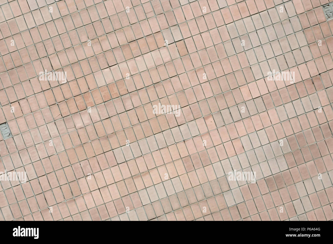 Old Soviet beige wall tiles. The texture of the classical outer tile ...